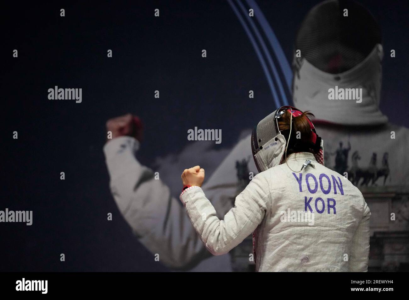 Korea's Jisu Yoon celebrates a point as she competes against Ucraine's ...