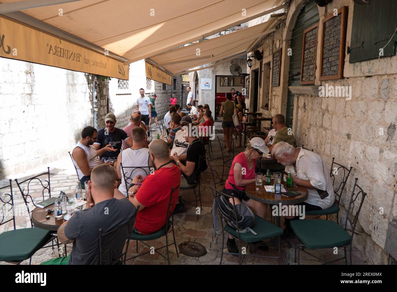 View of the city center of Kotor in Montenegro with people sitting in ...