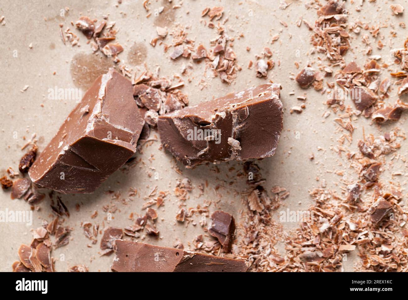 broken and crumbled natural chocolate, edible milk chocolate made from ...