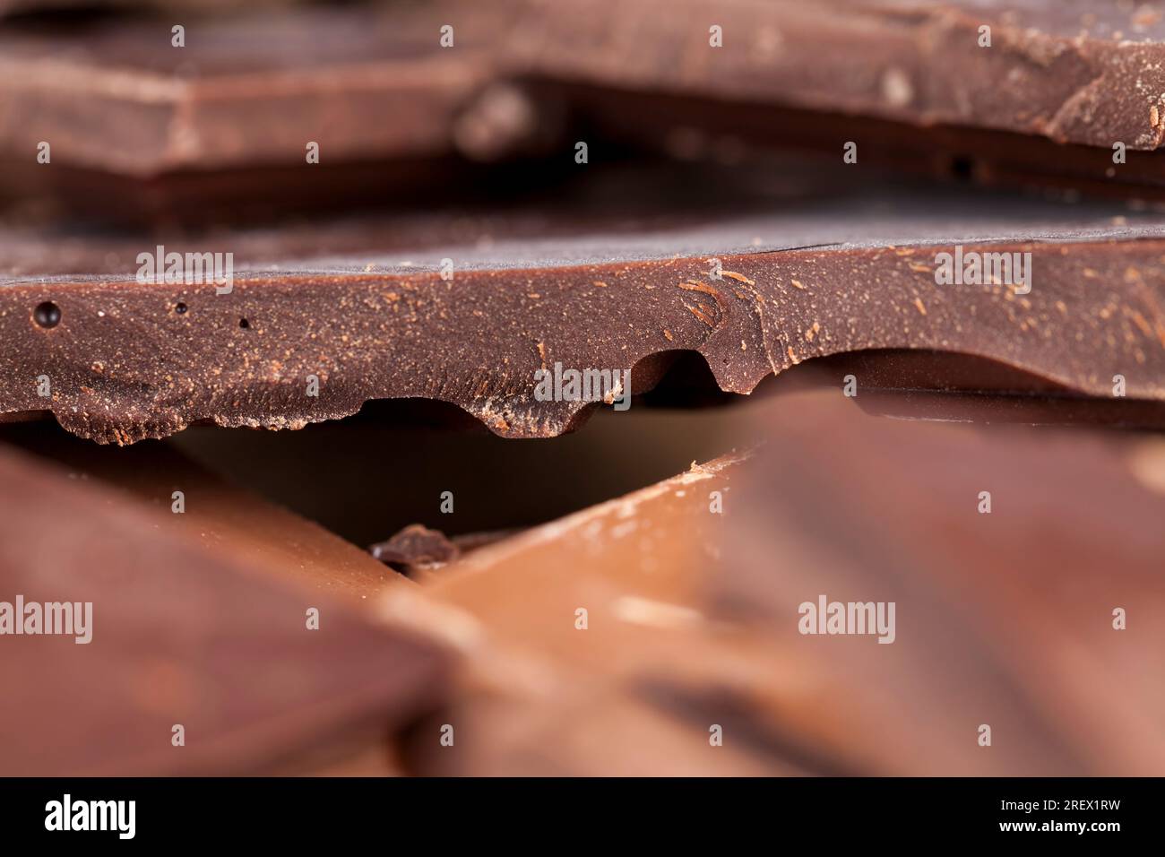 milk and bitter chocolate together broken into pieces with crumbs ...