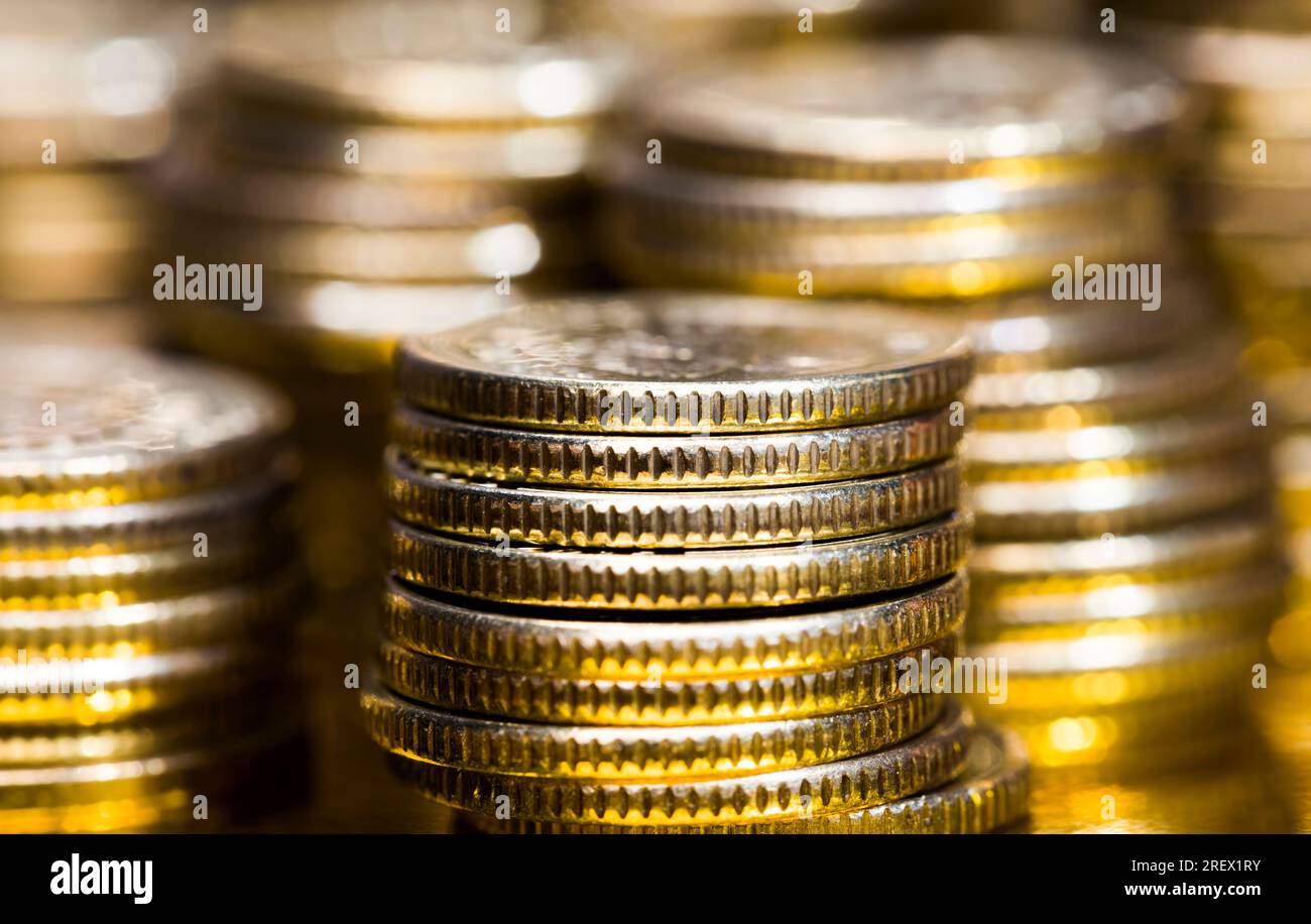round metal coins of Golden color, legal tender that is used for ...