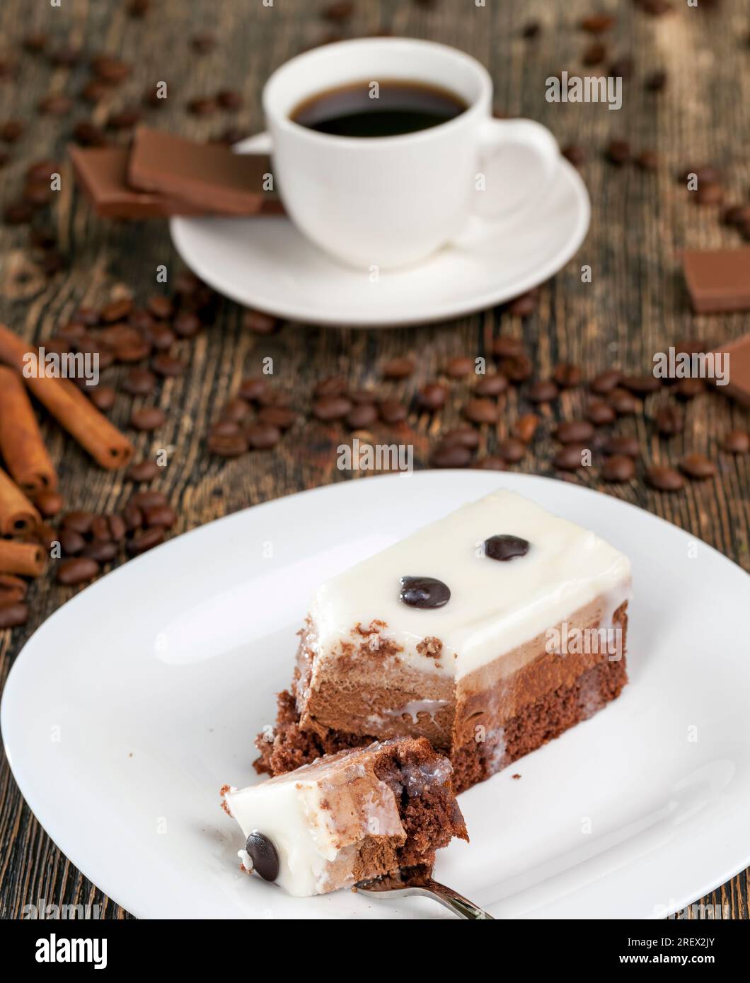 coffee with chocolate and multi layer cake for dessert, a delicious ...