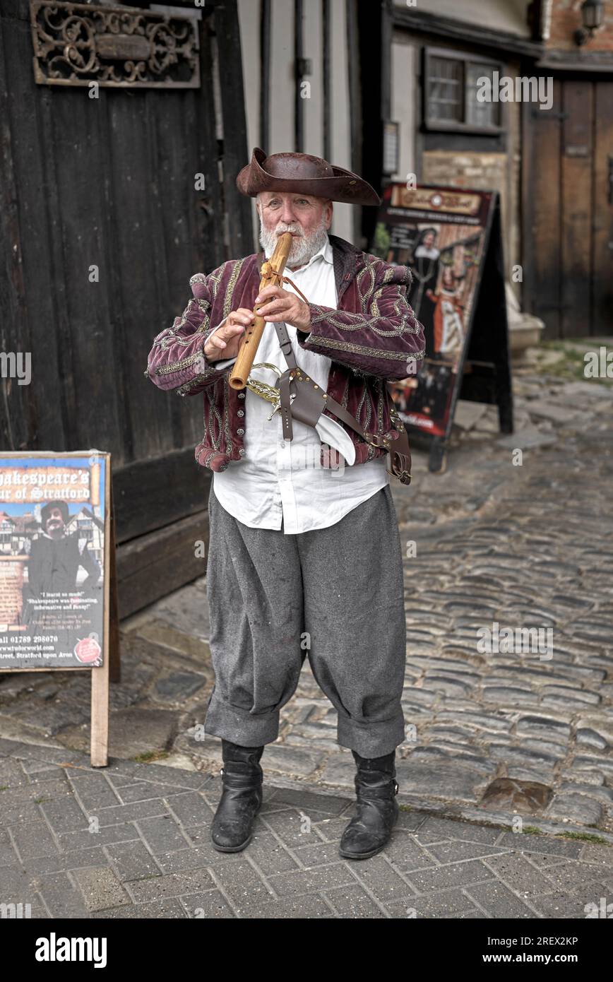 Tudor World flute player in traditional costume welcoming guests at ...
