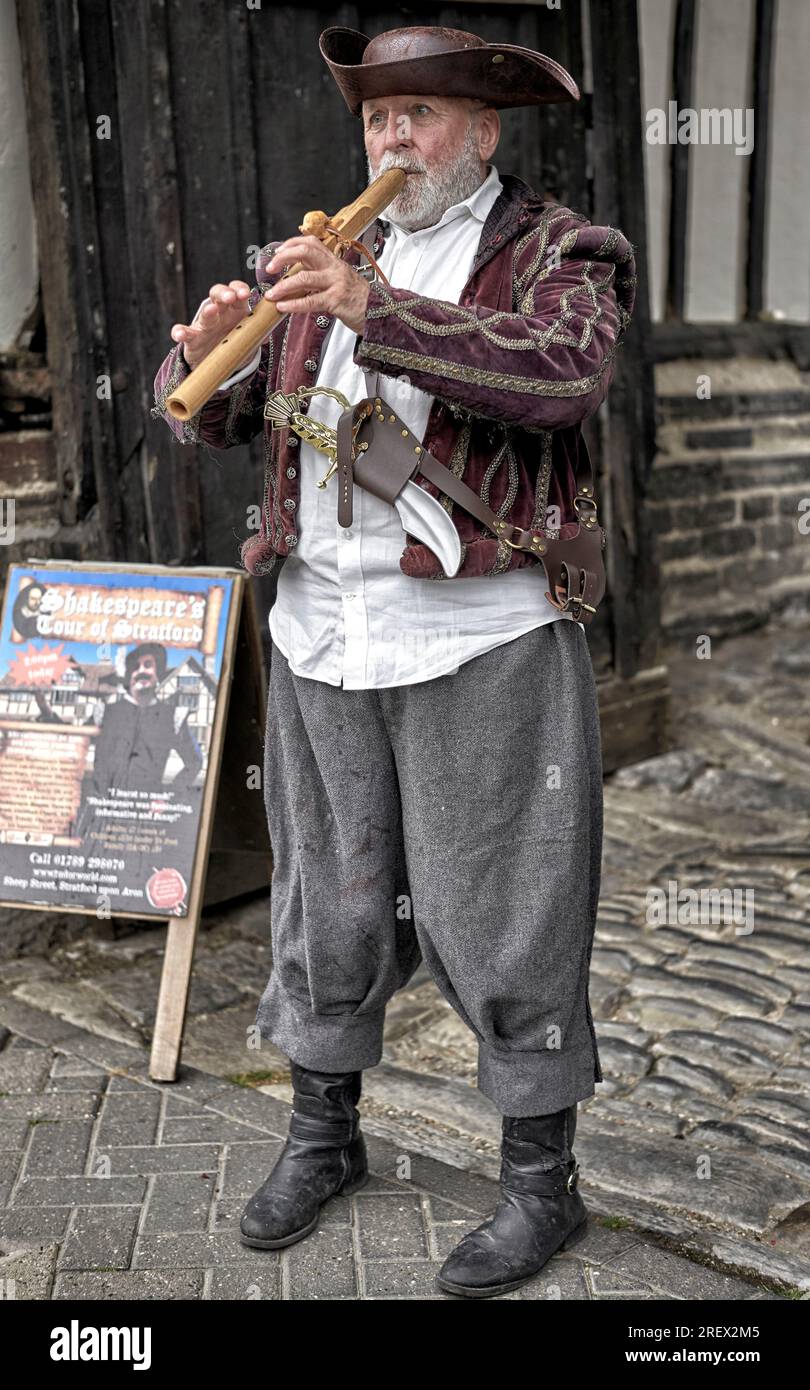 Tudor World flute player in traditional costume welcoming guests at ...