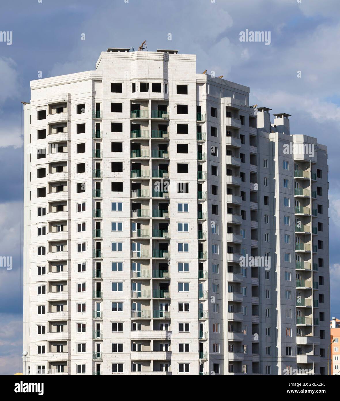 construction of a new multi storey building for people to live in ...