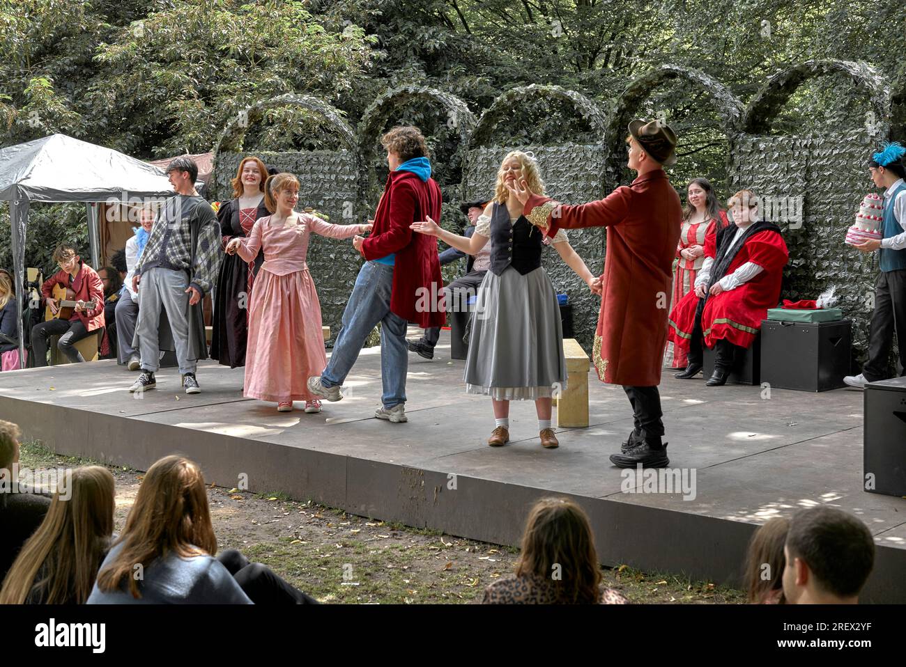 Actors on stage at an RSC open air theatre performing Shakespeare play ...