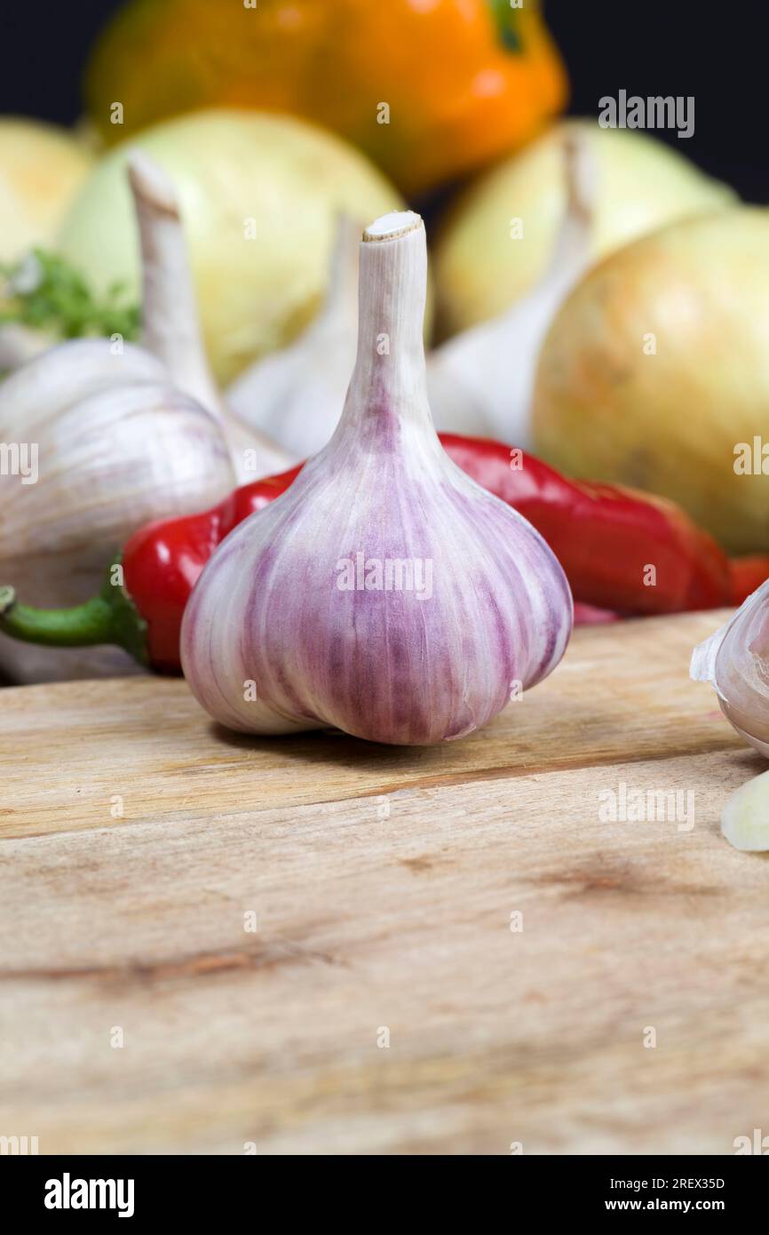 garlic spices on the kitchen table, cooking and salads from natural and ...