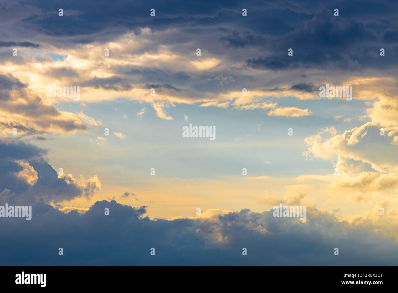 beautiful stormy sky with the sun peeping through Stock Photo - Alamy