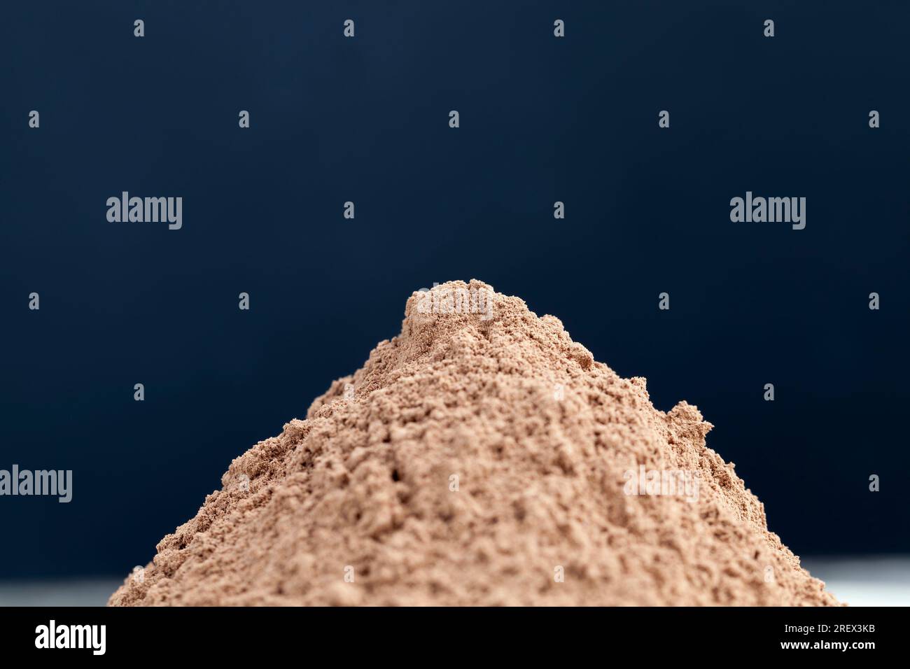 a large pile made from cocoa bean powder for making chocolate or other ...