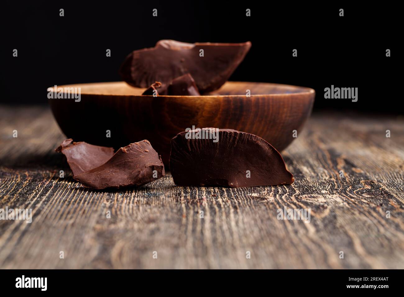 large chunks of chocolate with cocoa and cocoa butter, divided into ...