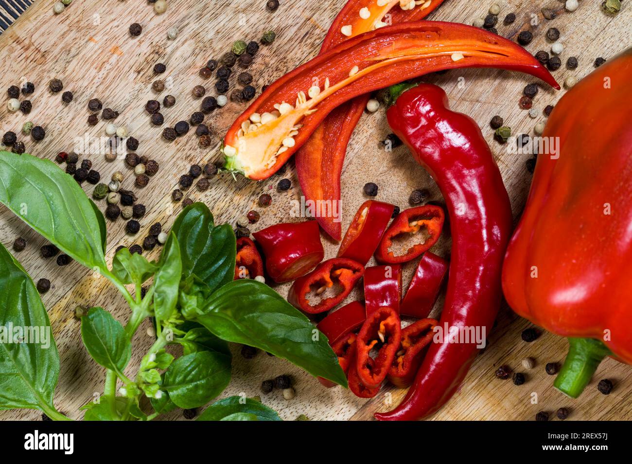 pepper spices on the kitchen table, cooking and salads from natural and ...