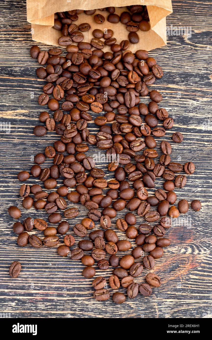 closeup aromatic coffee beans in raw or roasted form, coffee beans for ...