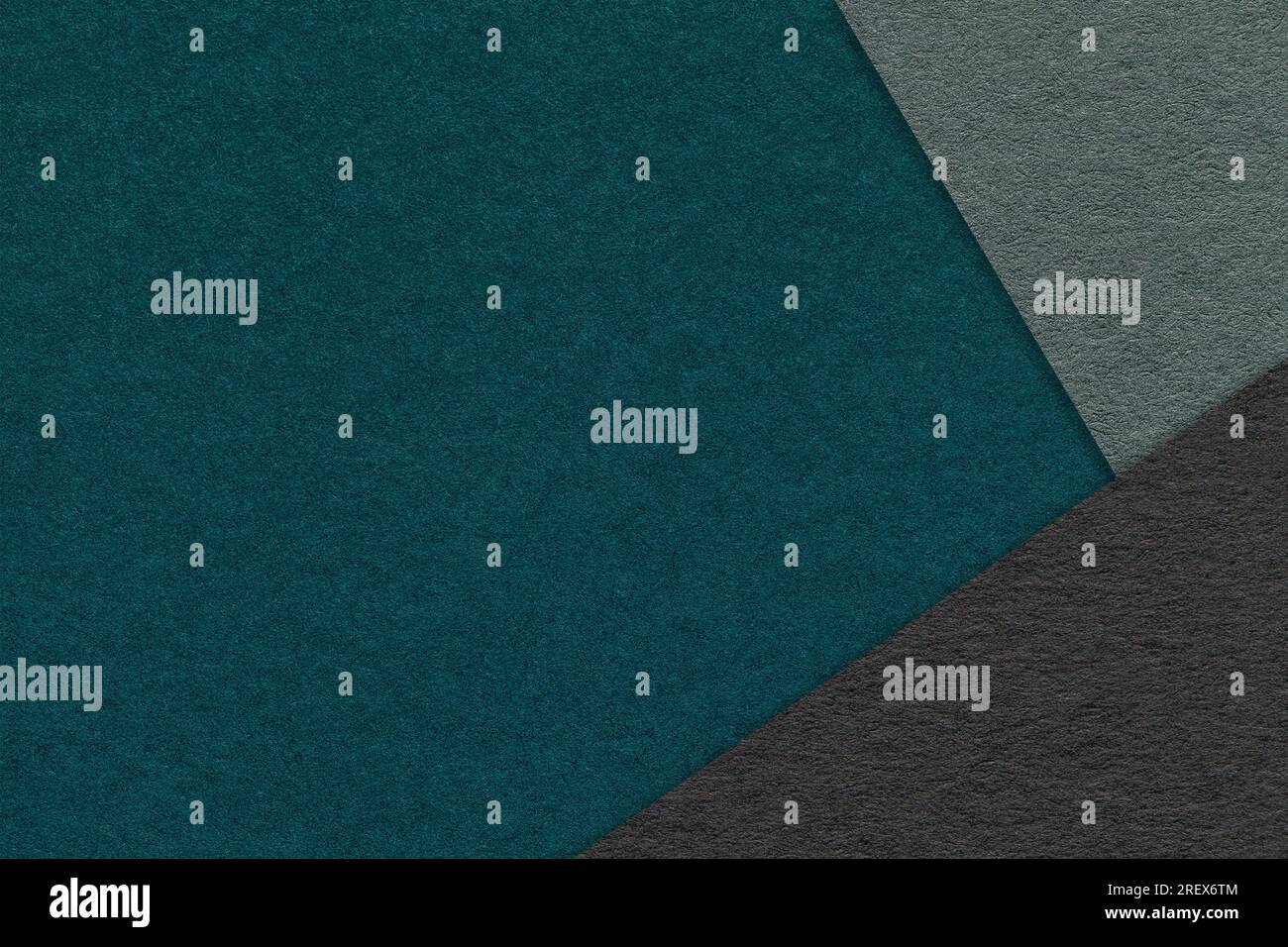 Texture of craft dark teal color paper background with green and black ...