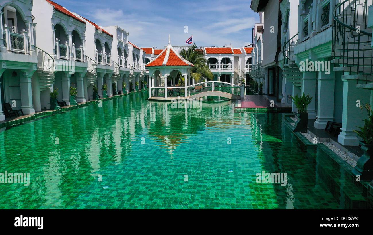 View of swimming pool inside the hotel. Green color of swimming pool at ...