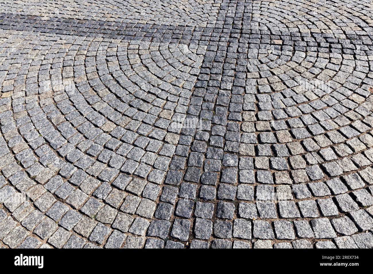 road or pavement made of stones tiles and cobblestones, part of a ...