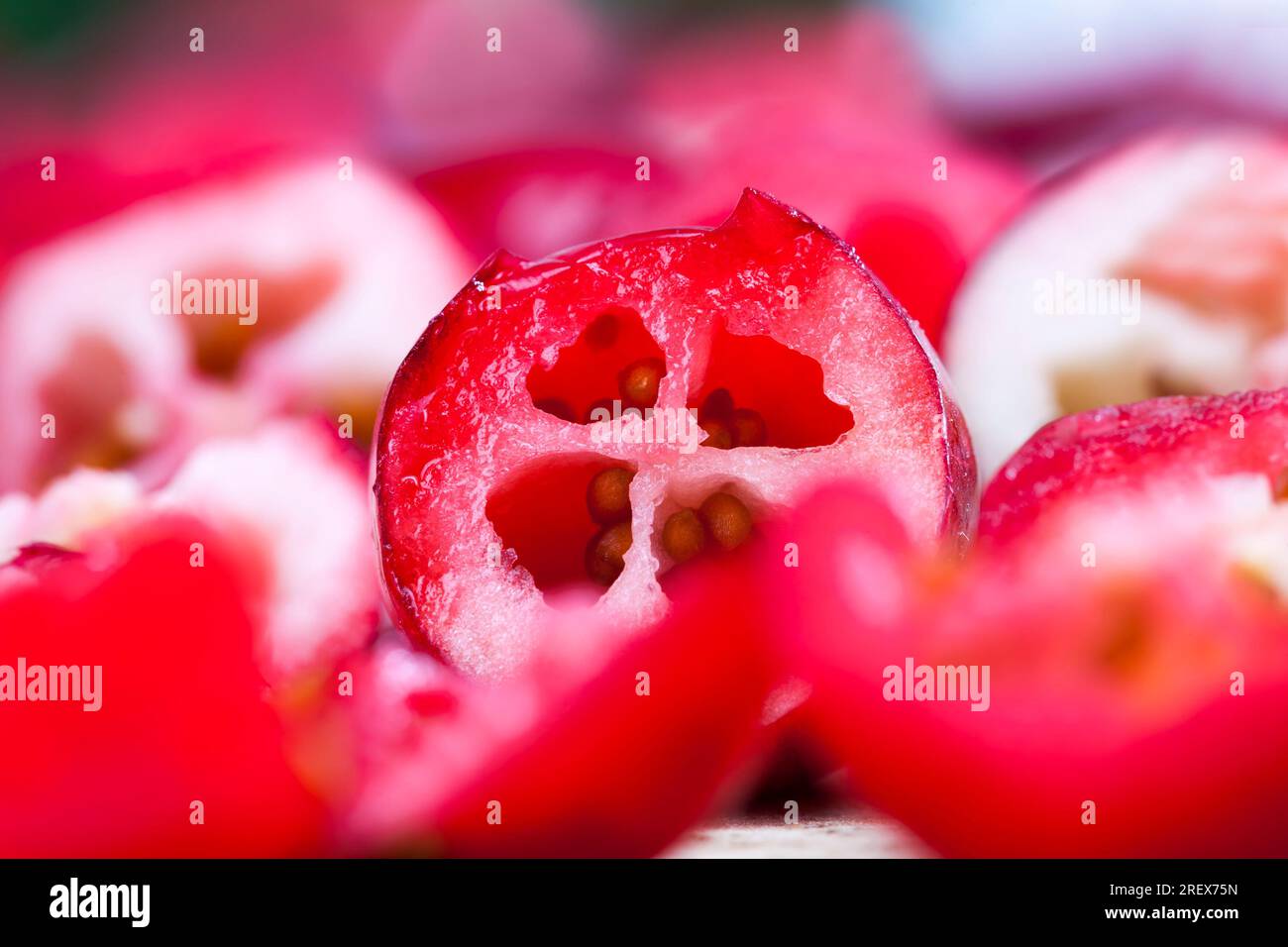 red cut sour useful cranberries, red ripe divided cranberries on the ...