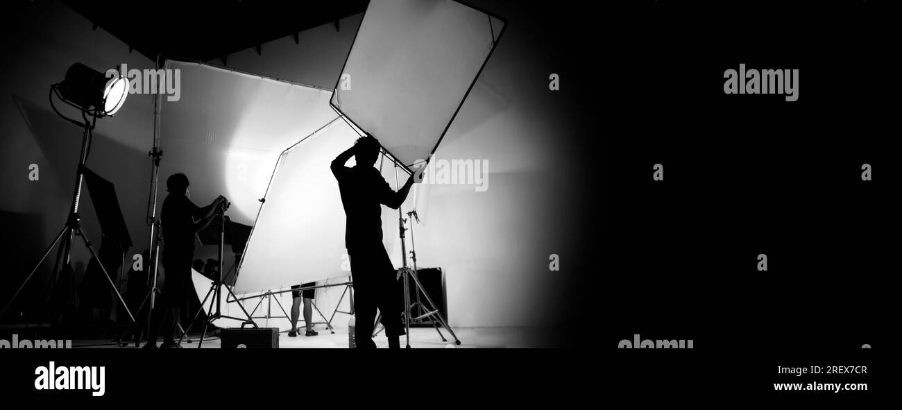 Silhouette of video production behind the scenes or B roll or making of ...