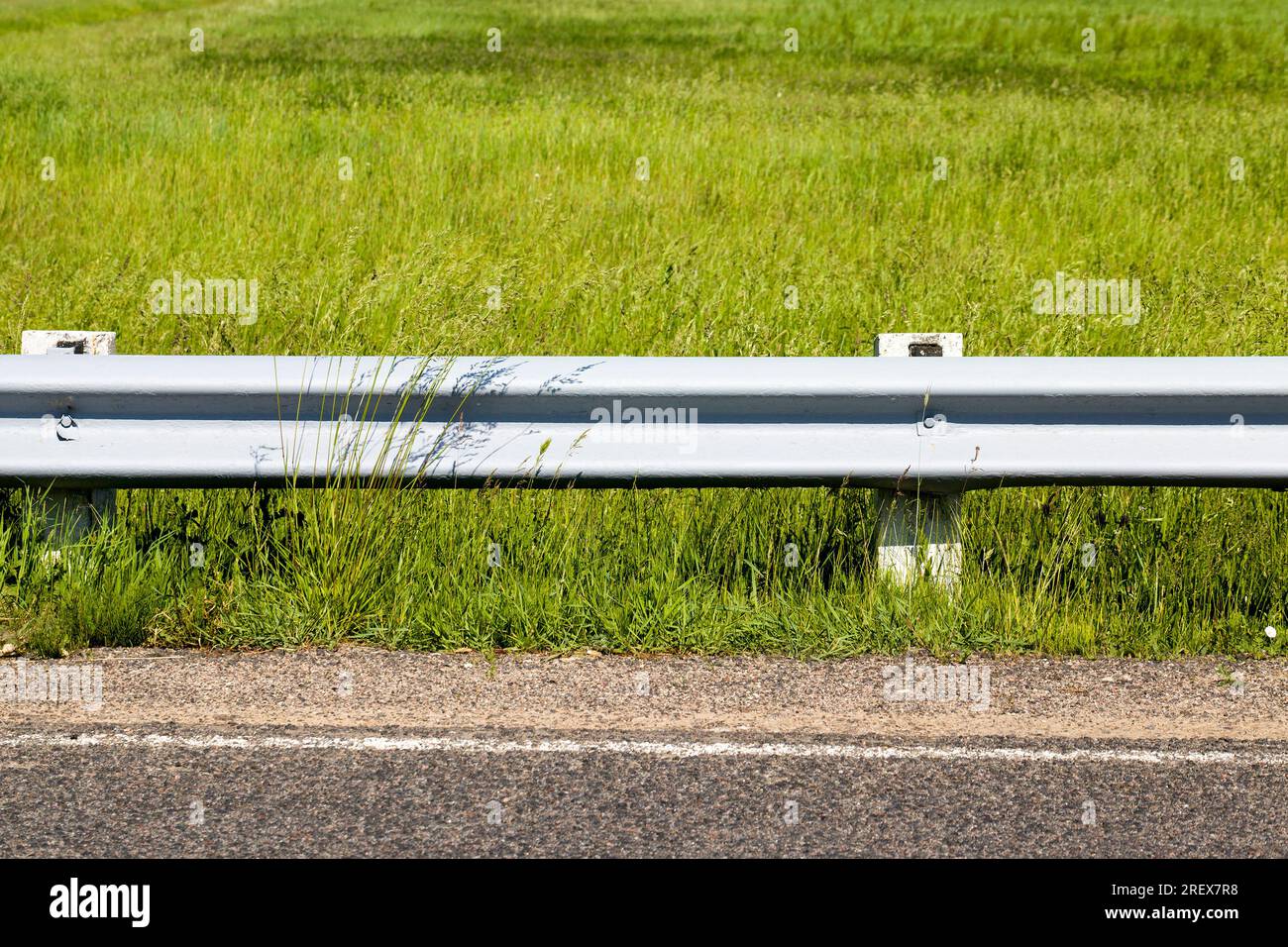metal road barriers to ensure safety while driving on the roadway ...