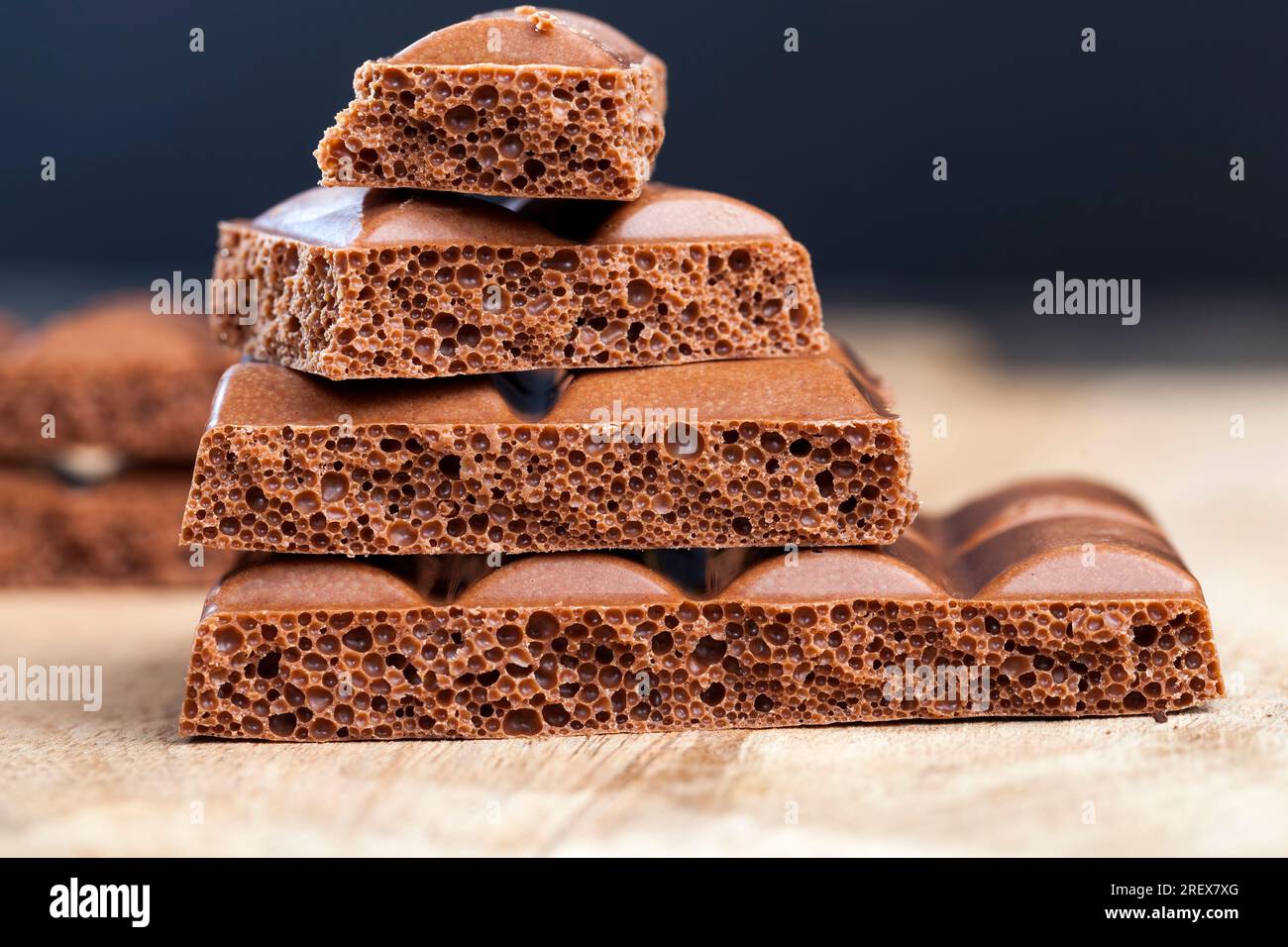 divided into pieces chocolate bar, air milk chocolate broken into ...