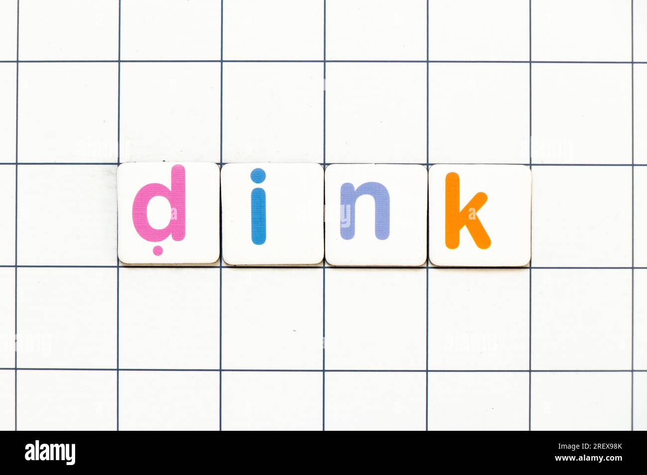 Colorful tile letter in word DINK (Abbreviation of Double income, no ...