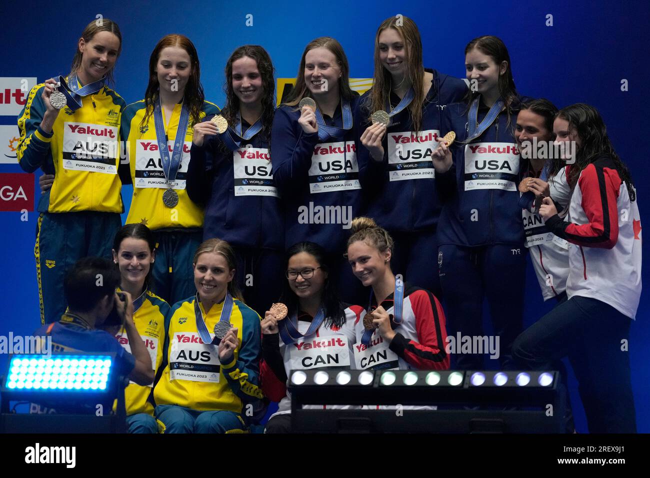 Gold medalist Team U.S., silver medalist Team Australia and bronze medalist Team Canada pose for ...