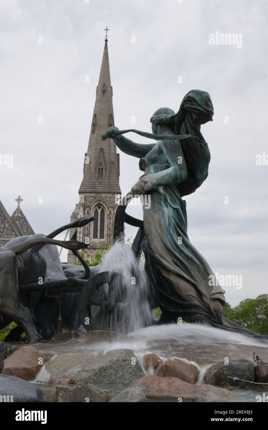 Gefion Fountain Copenhagen, Denmark which features oxen being driven by ...