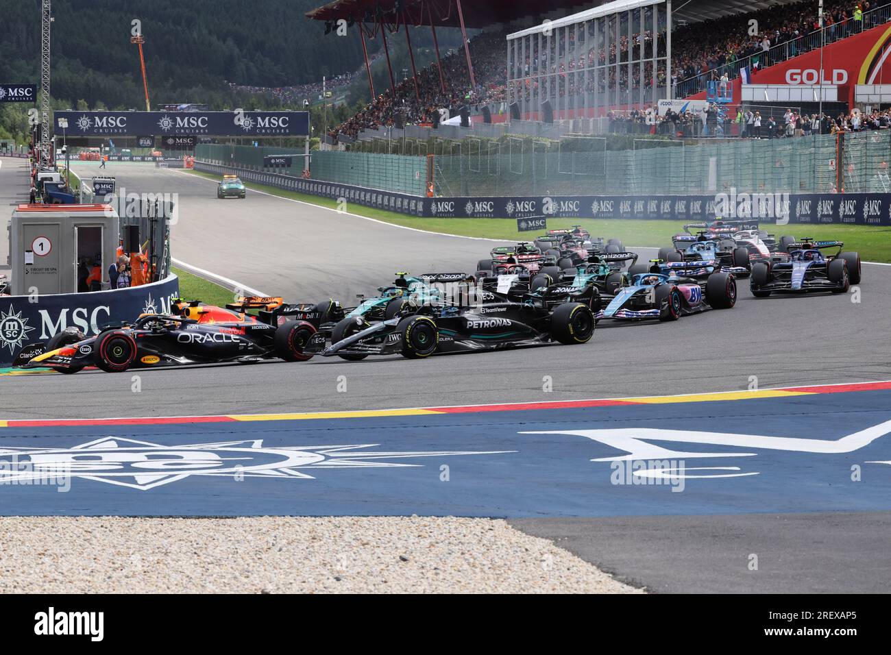 Red Bull driver Max Verstappen of the Netherlands, left, steers his car ...