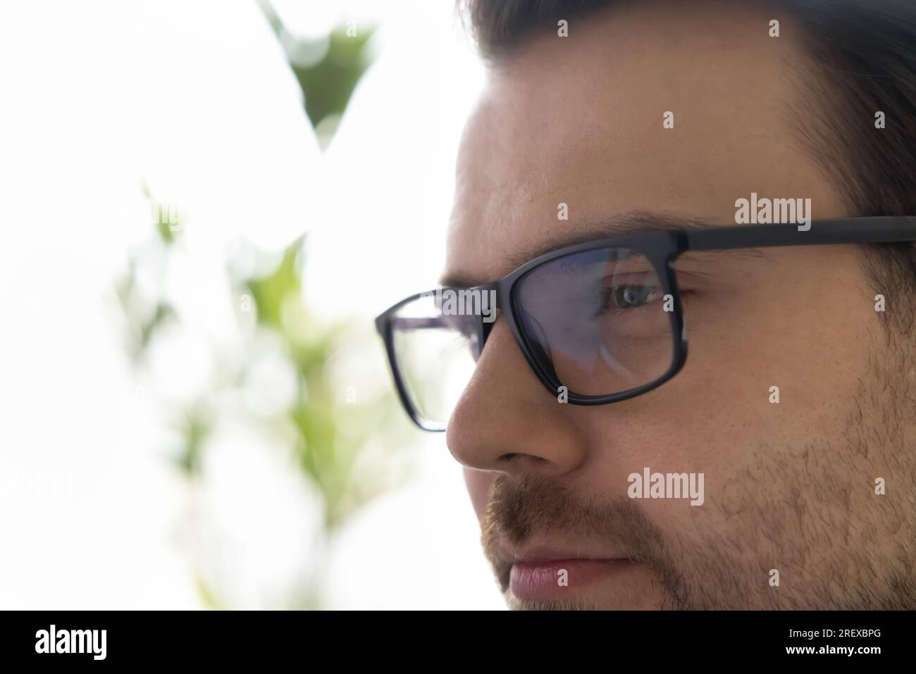 Face of thoughtful handsome adult man with stubble looking away Stock ...