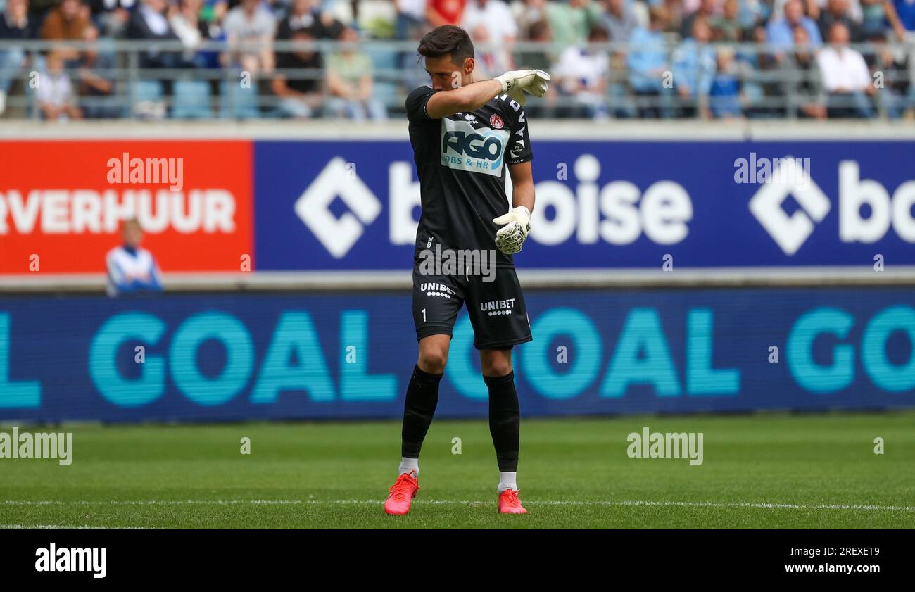 Gent, Belgium. 30th July, 2023. Kortrijk's goalkeeper Tom Vandenberghe ...