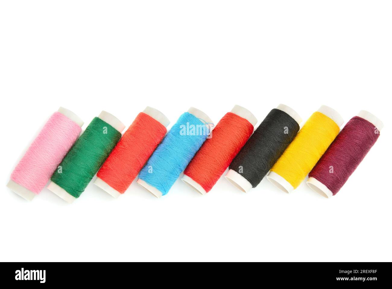 A set of sewing thread isolated on a white background. Free space for ...