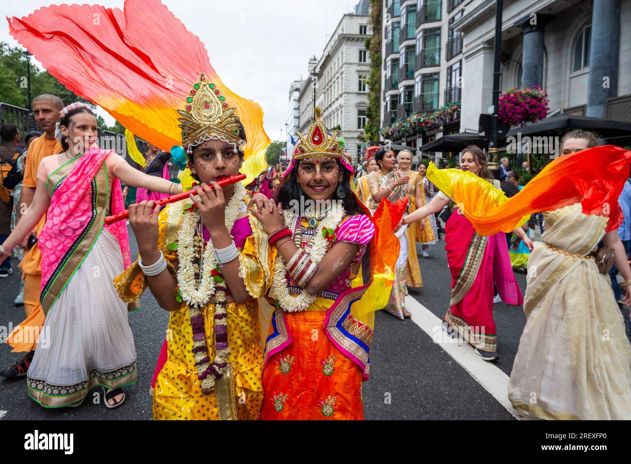 London, UK. 30 July 2023. Young Hare Krishna devotees as (C) Lord ...