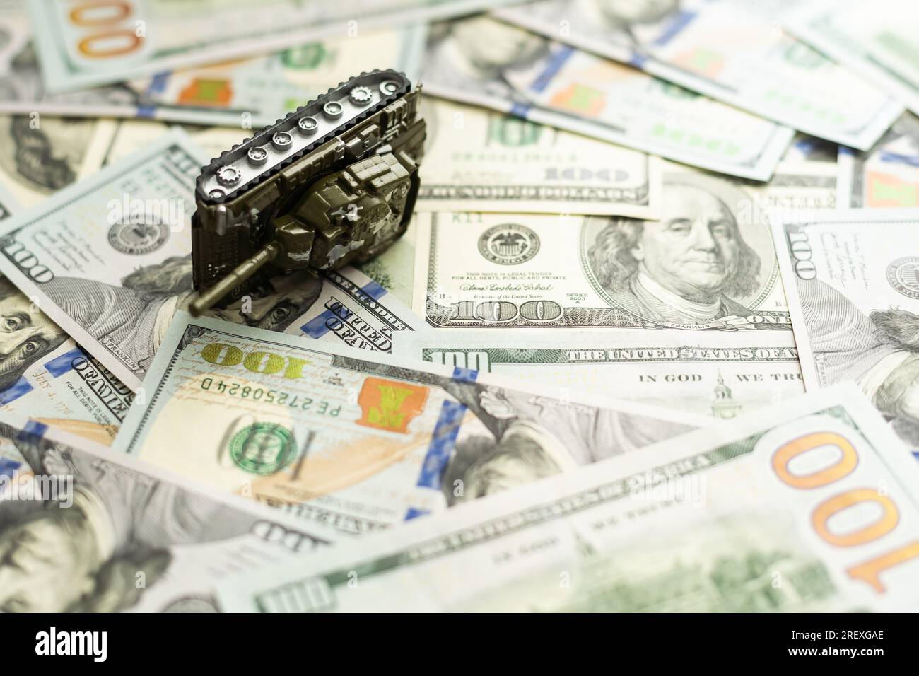 One Hundred Dollar Bill Ripped in Half Isolated on a White Background ...