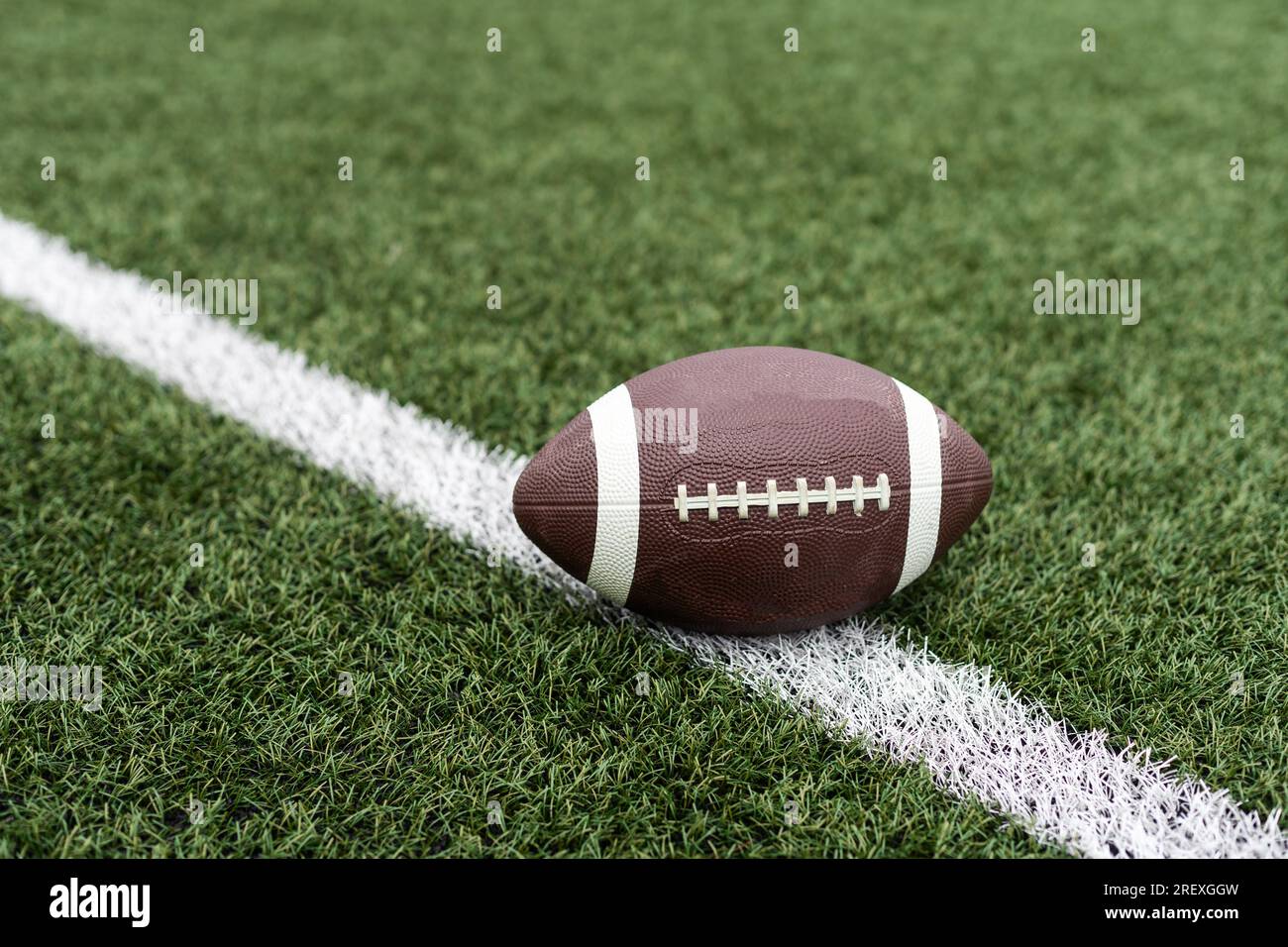 Football on Yardage Marker. Low Angle. Horizontal View Stock Photo - Alamy