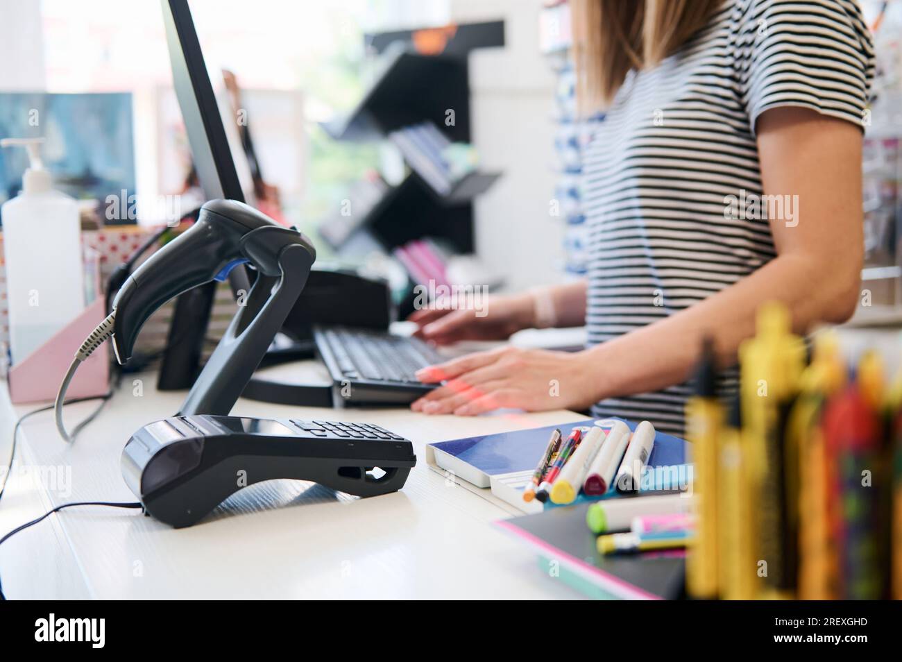 Selective focus on a barcode scanner and POS terminal or credit card ...