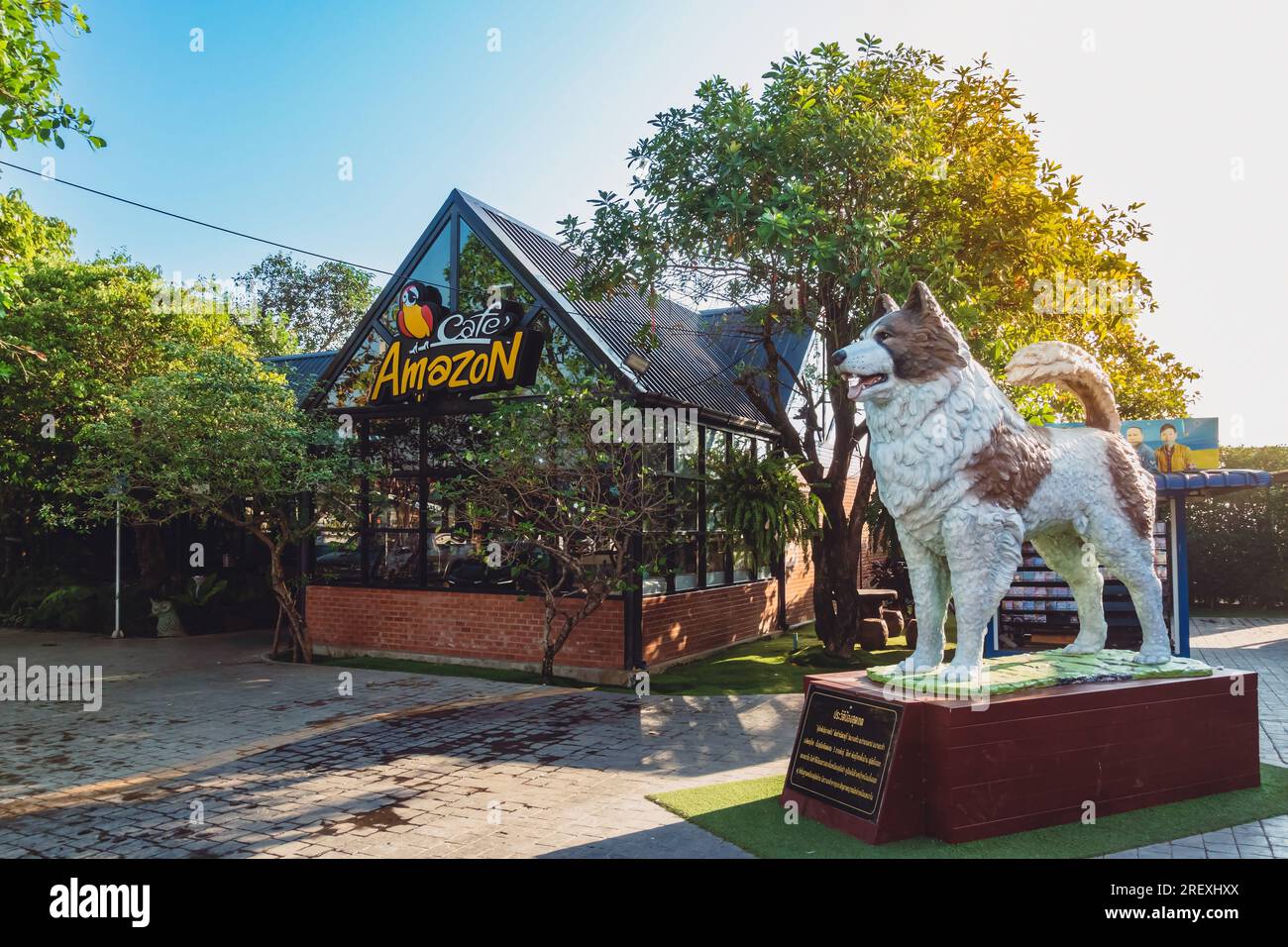 PHITSANULOK -THAILAND,DECEMBER 11 ,2020 : A beautiful statue of white-brown dog of the Bang Kaeo ...
