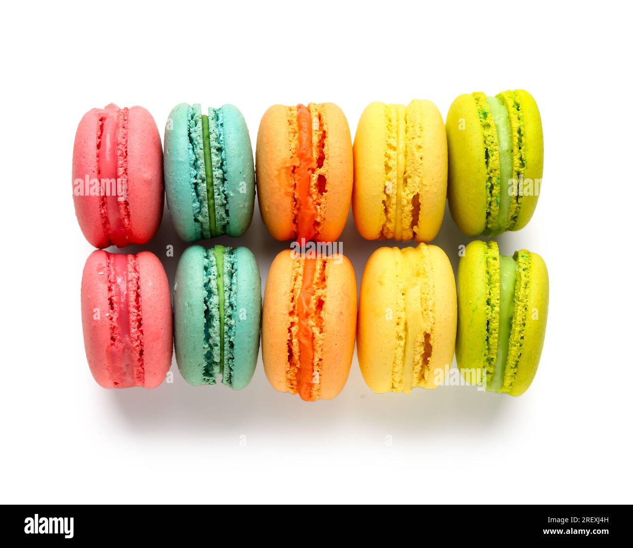 Different tasty sweet macaroons on white background Stock Photo - Alamy