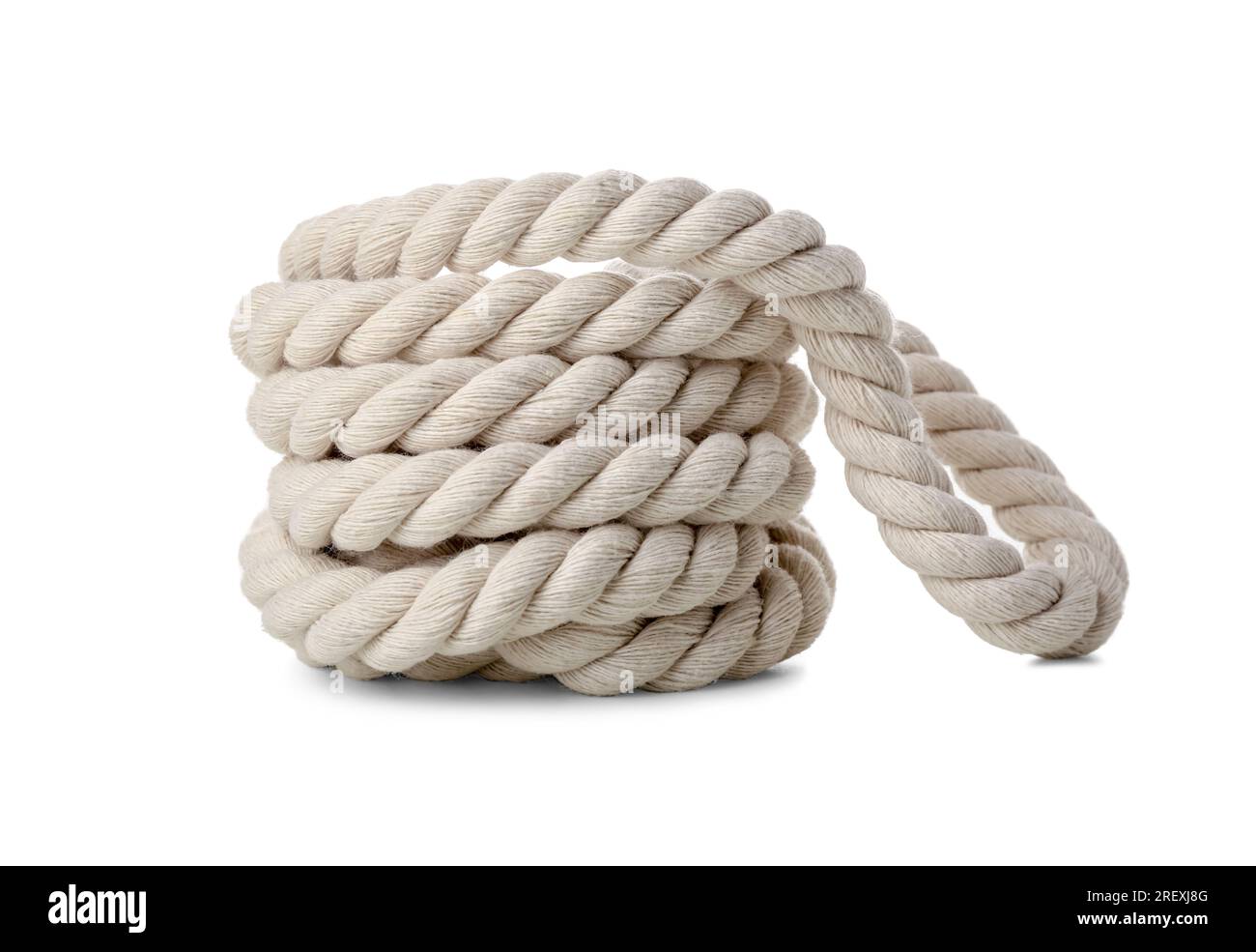 Rolled rope on white background Stock Photo - Alamy