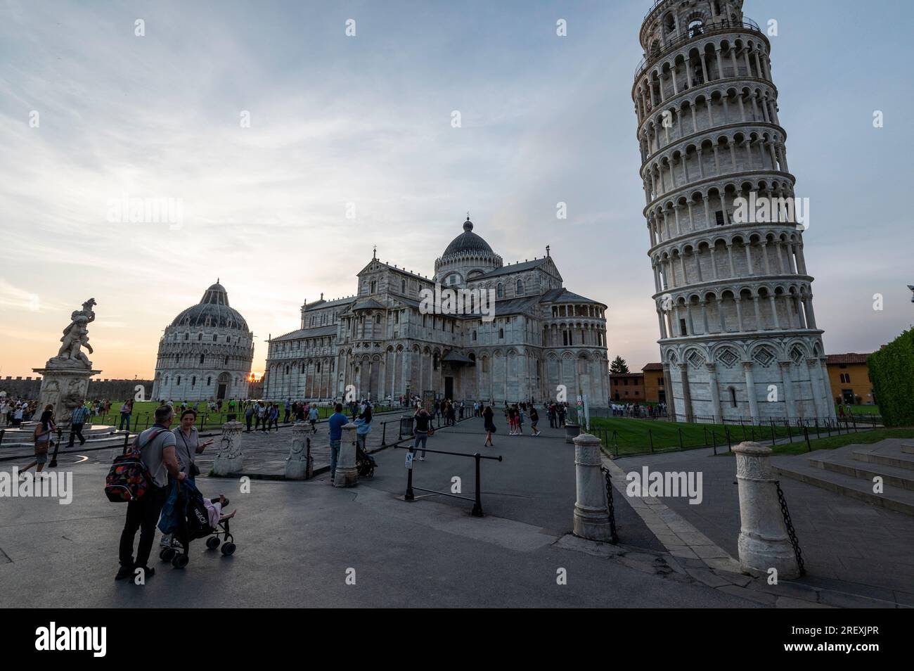 At dusk of the Leaning Tower, Cathedral and Baptistery on Piazza Del ...