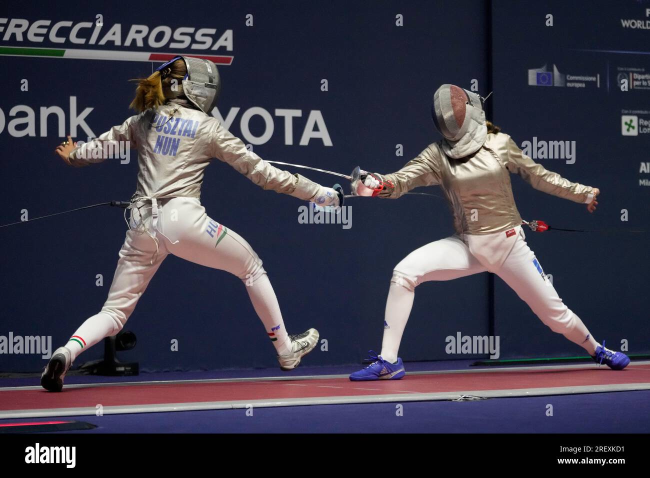 Hungary's Liza Pusztai, left, competes against France's Manon Apithy ...