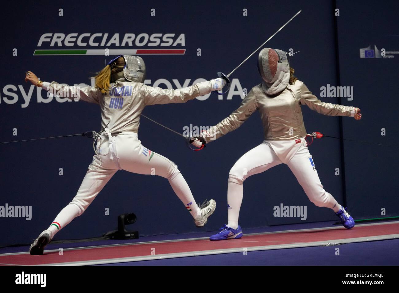 Hungary's Liza Pusztai, left, competes against France's Manon Apithy ...
