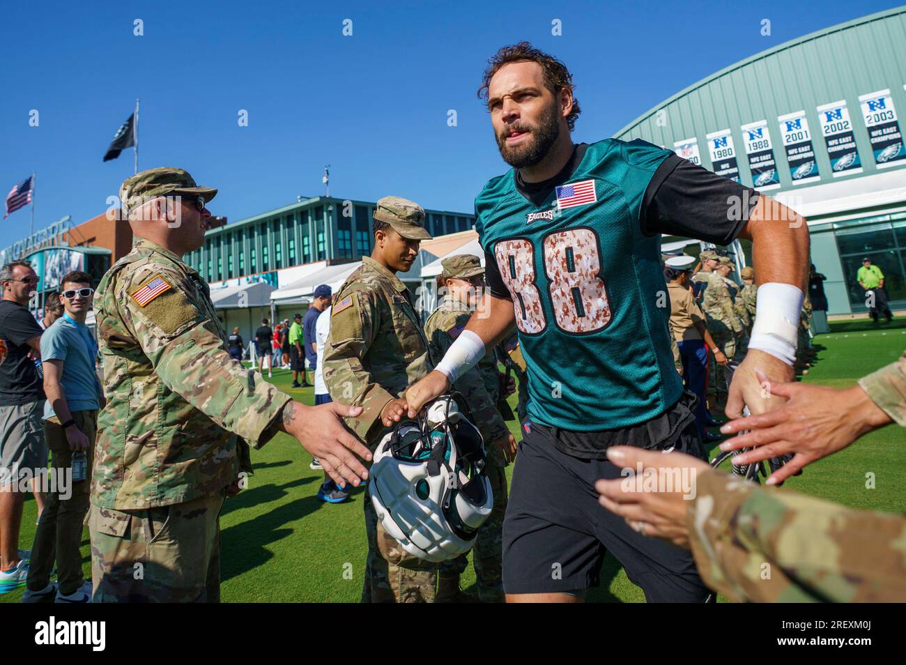 Philadelphia Eagles' Dallas Goedert make his way through the high five ...