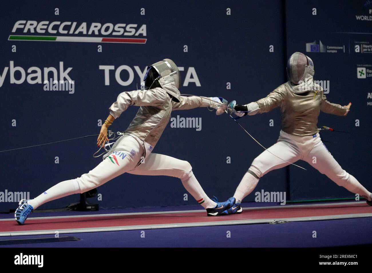 Hungary's Luca Szucs , left, competes against France's Caroline Queroli ...