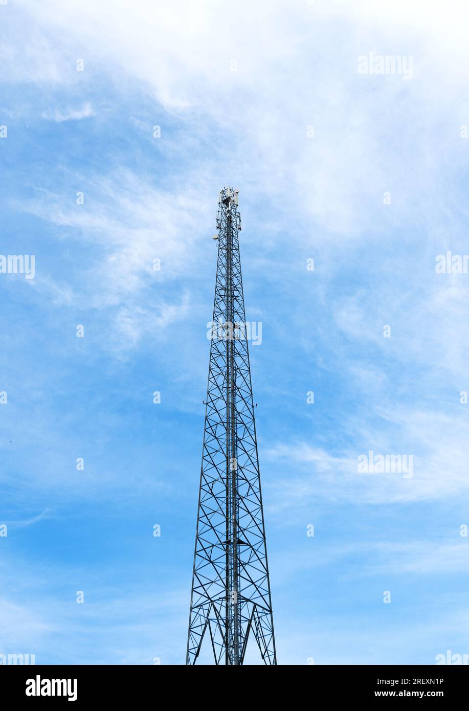 mobile tower on blue sky background Stock Photo - Alamy