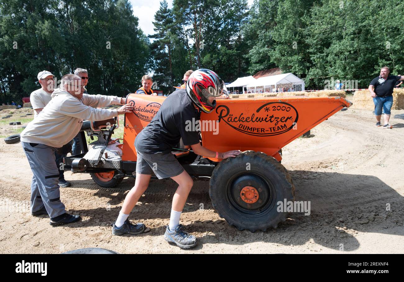 Horka, Germany. 30th July, 2023. A participant with helpers pushes his ...