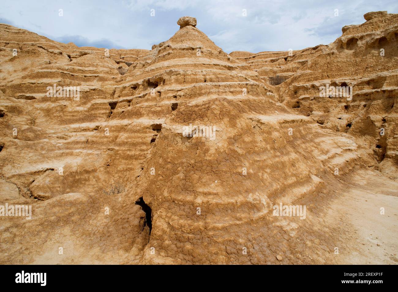 Badlands are a dry terrains formed with softer sedimentary rocks (clay ...