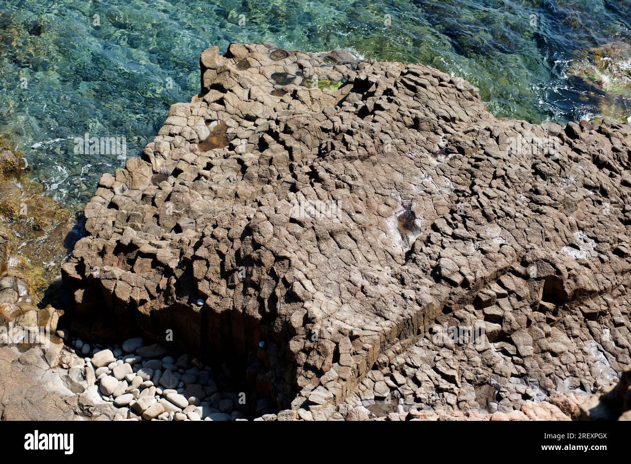Columnar dacite. Dacite is an extrusive or volcanic rock. This photo ...