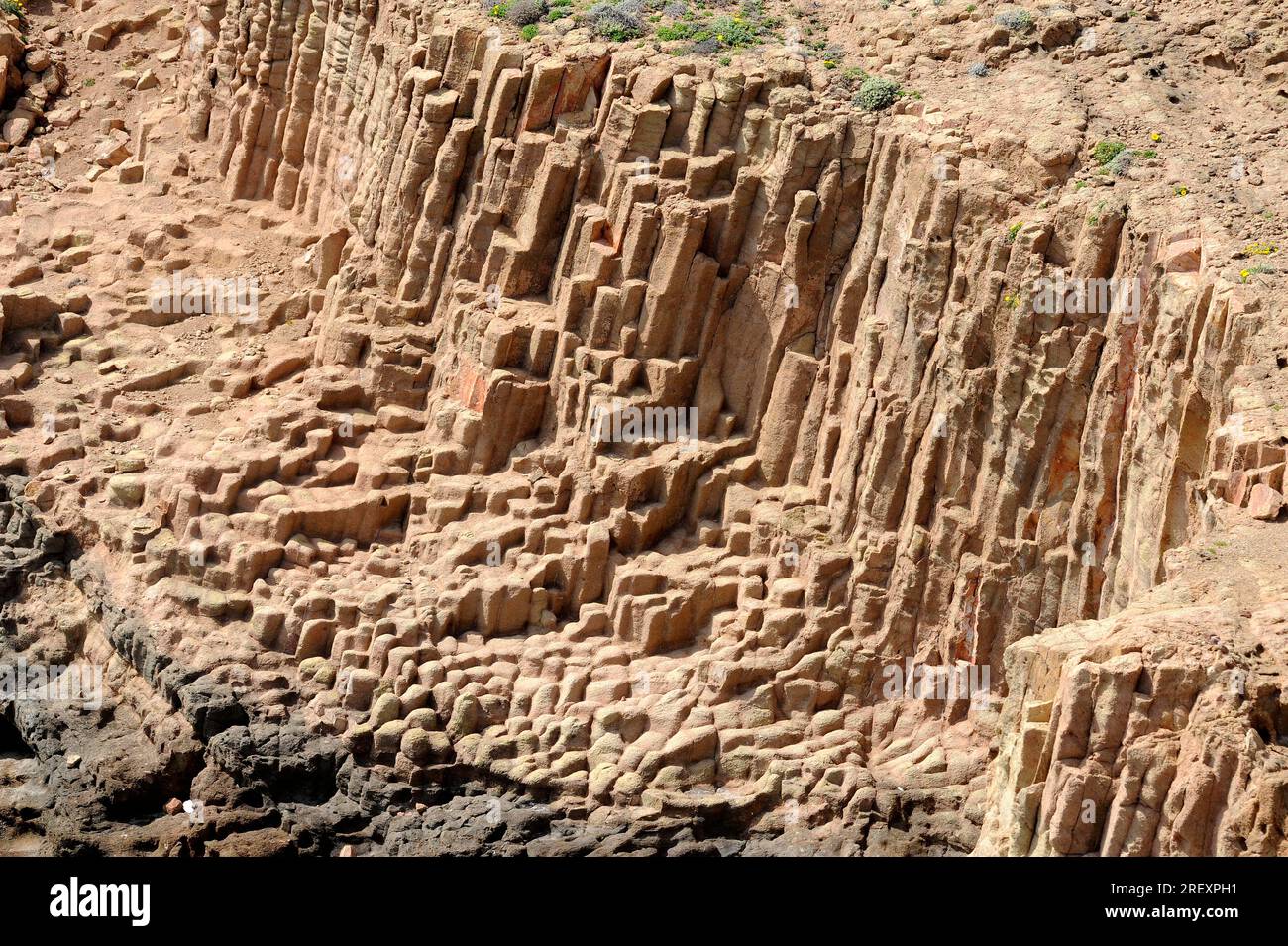 Columnar dacite. Dacite is an extrusive or volcanic rock. This photo ...