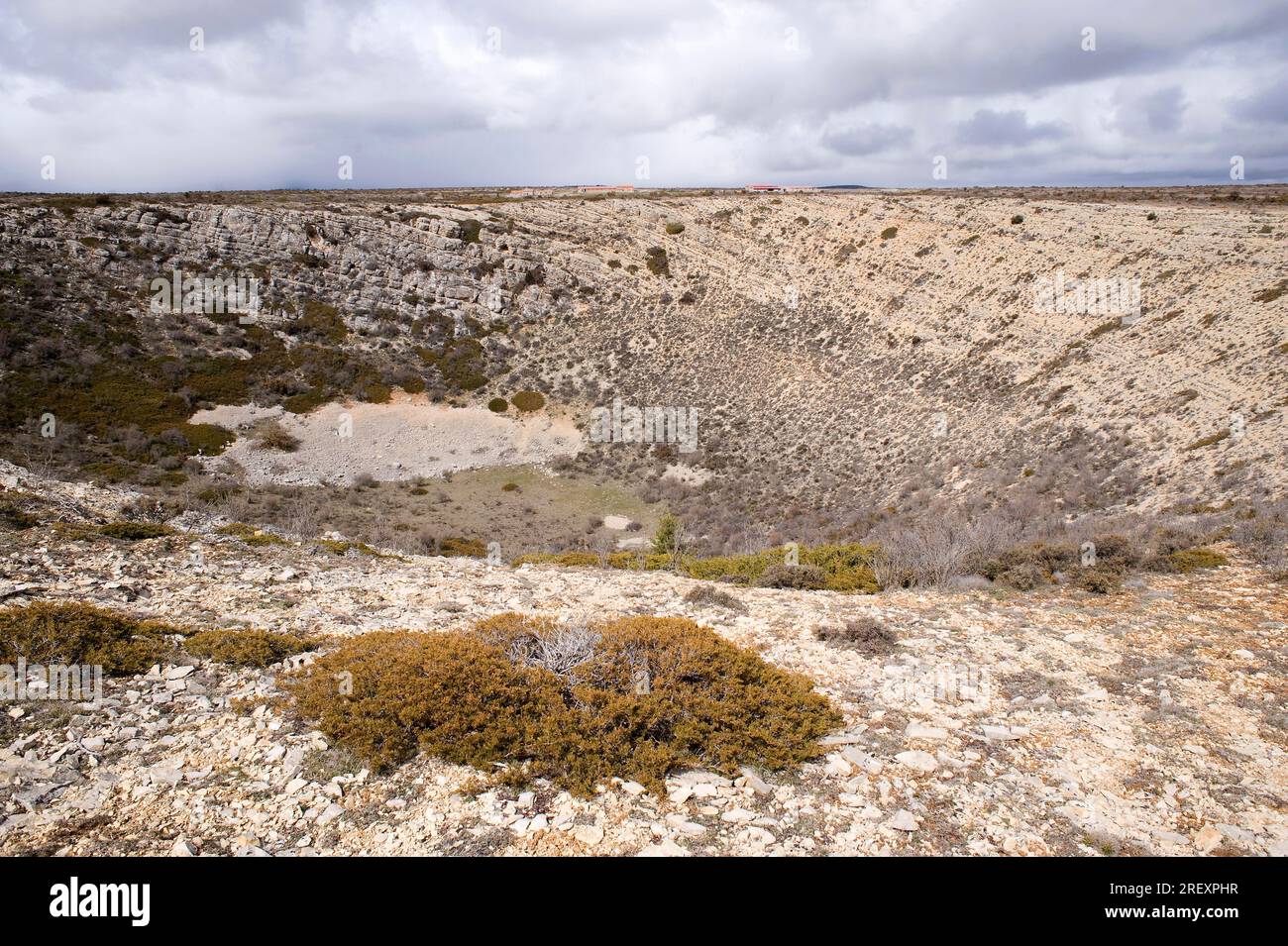Doline or sinkhole is a hole in the ground caused by a karstic proces ...