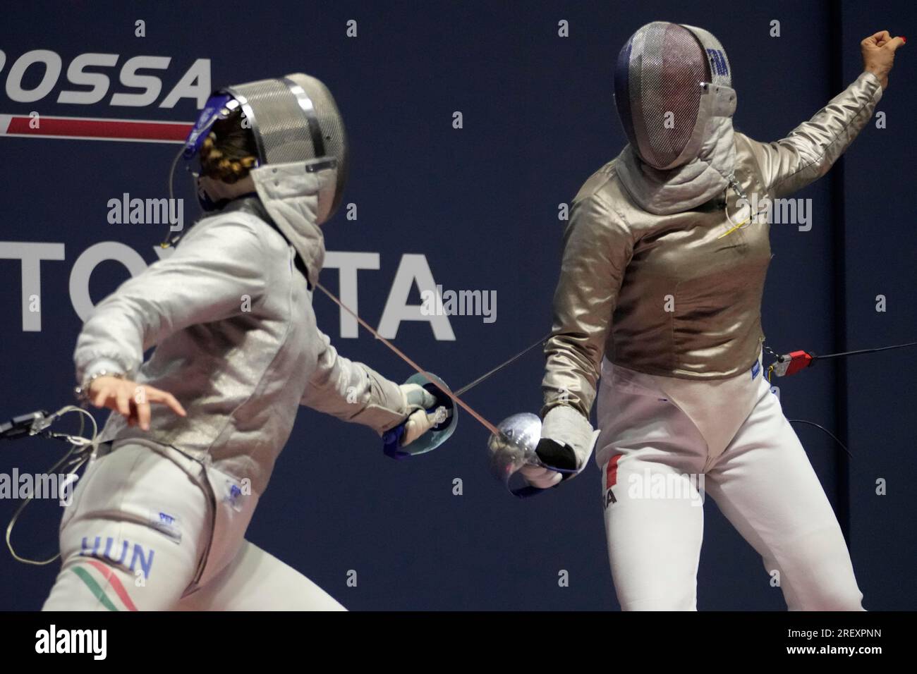 France's Caroline Queroli, right, competes against Hungary's Sugar ...
