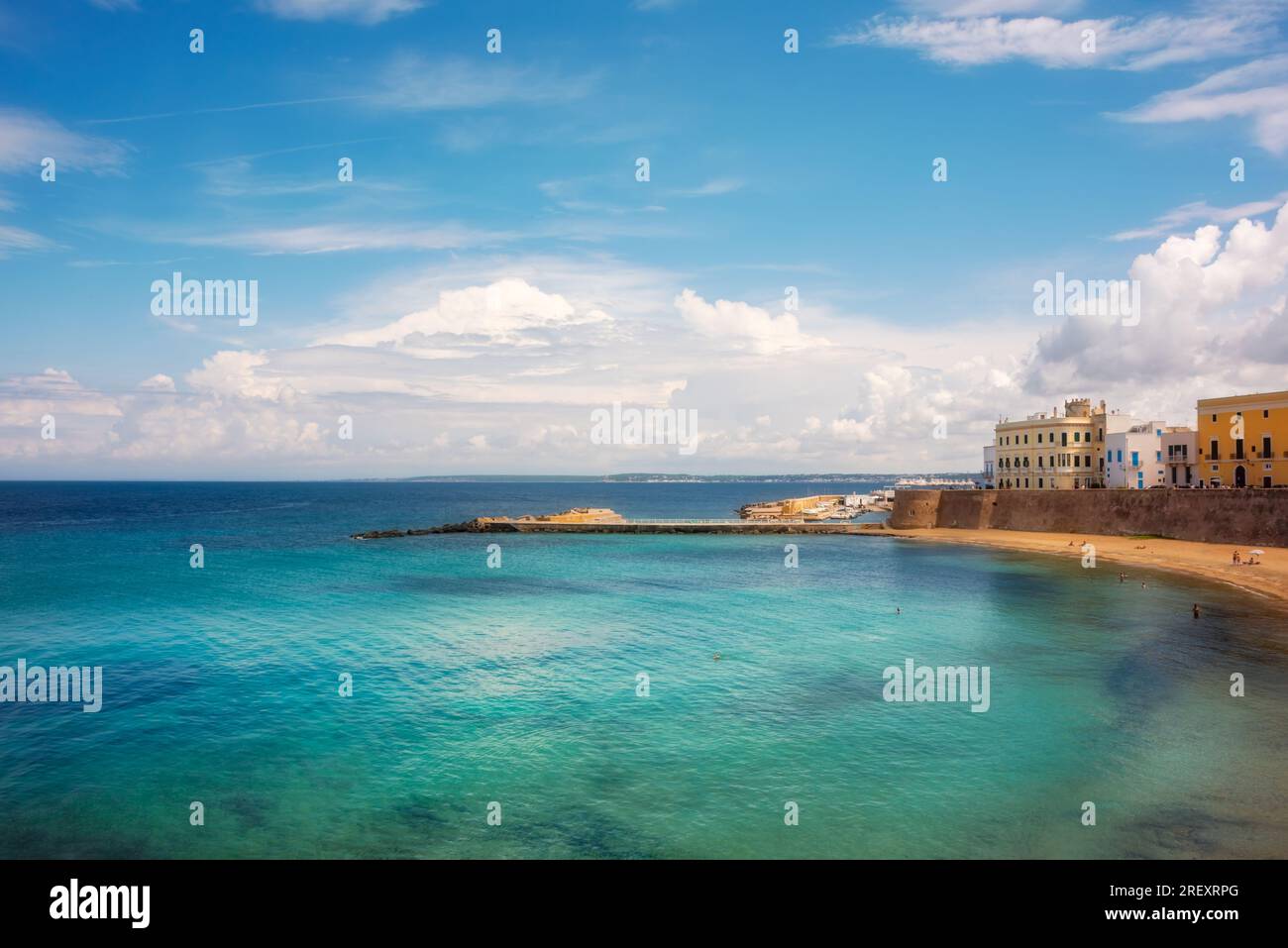 Coastline and beach with turquoise water in town of Gallipoli, Italy ...